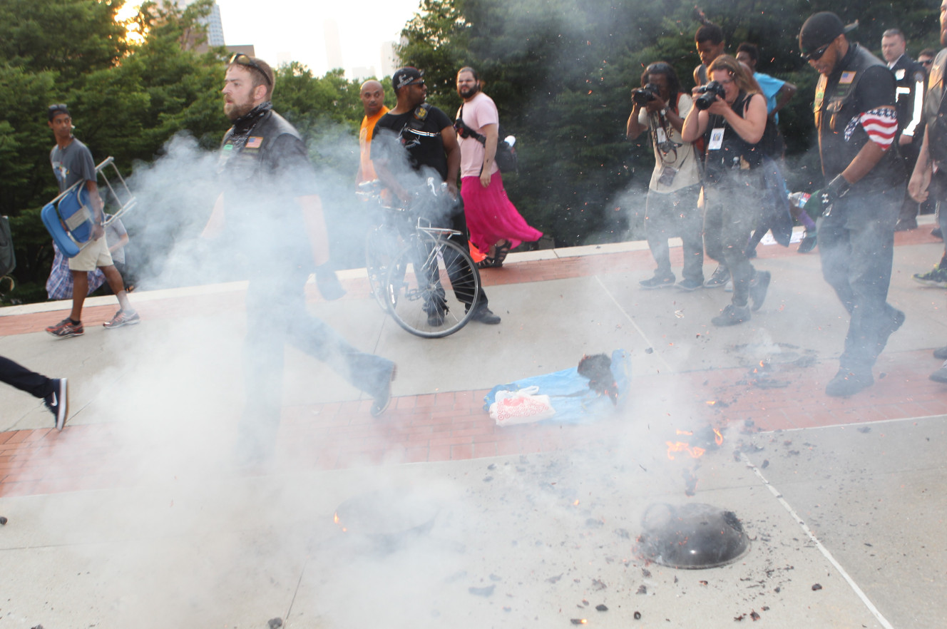 Protesters Burn Flag To Protest Cops, Need Cops To Save Them - Law Officer