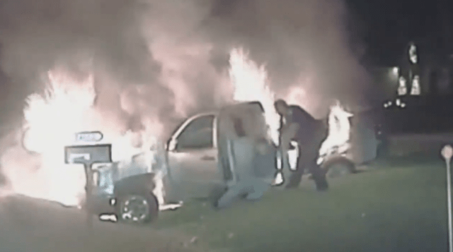 Michigan police release harrowing video showing officer rescue woman ...